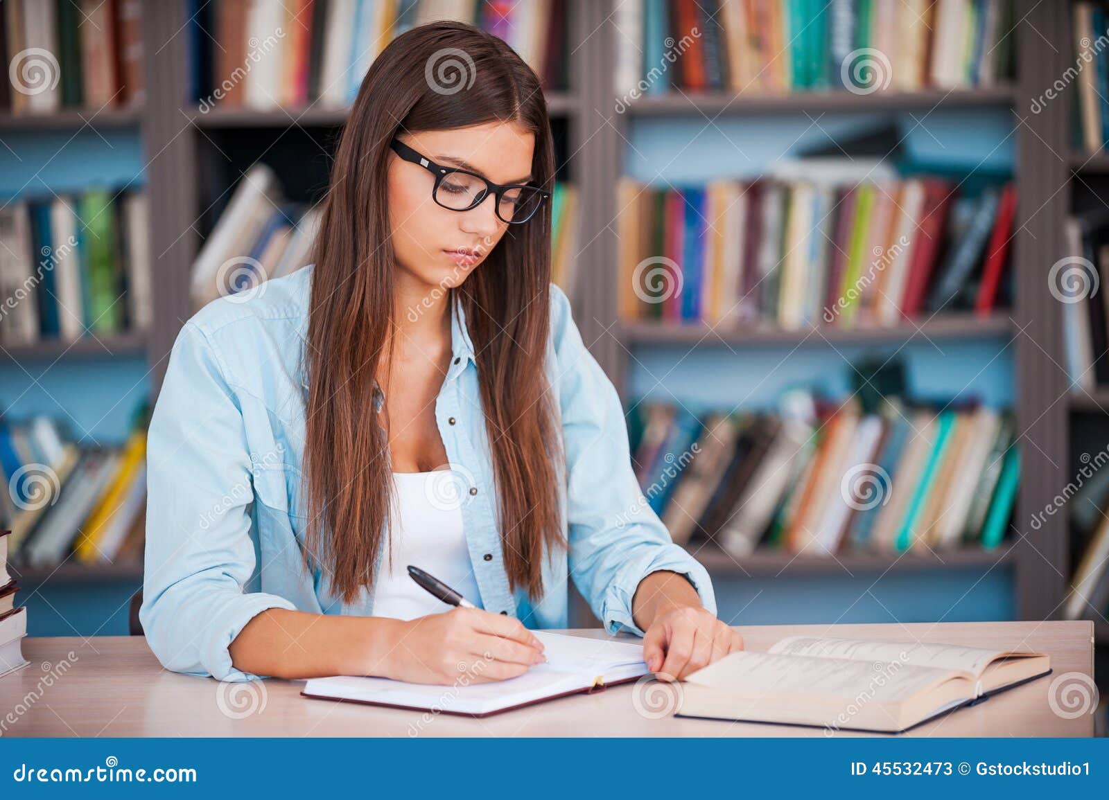 Doing her homework. stock image. Image of objects, desk - 45532473