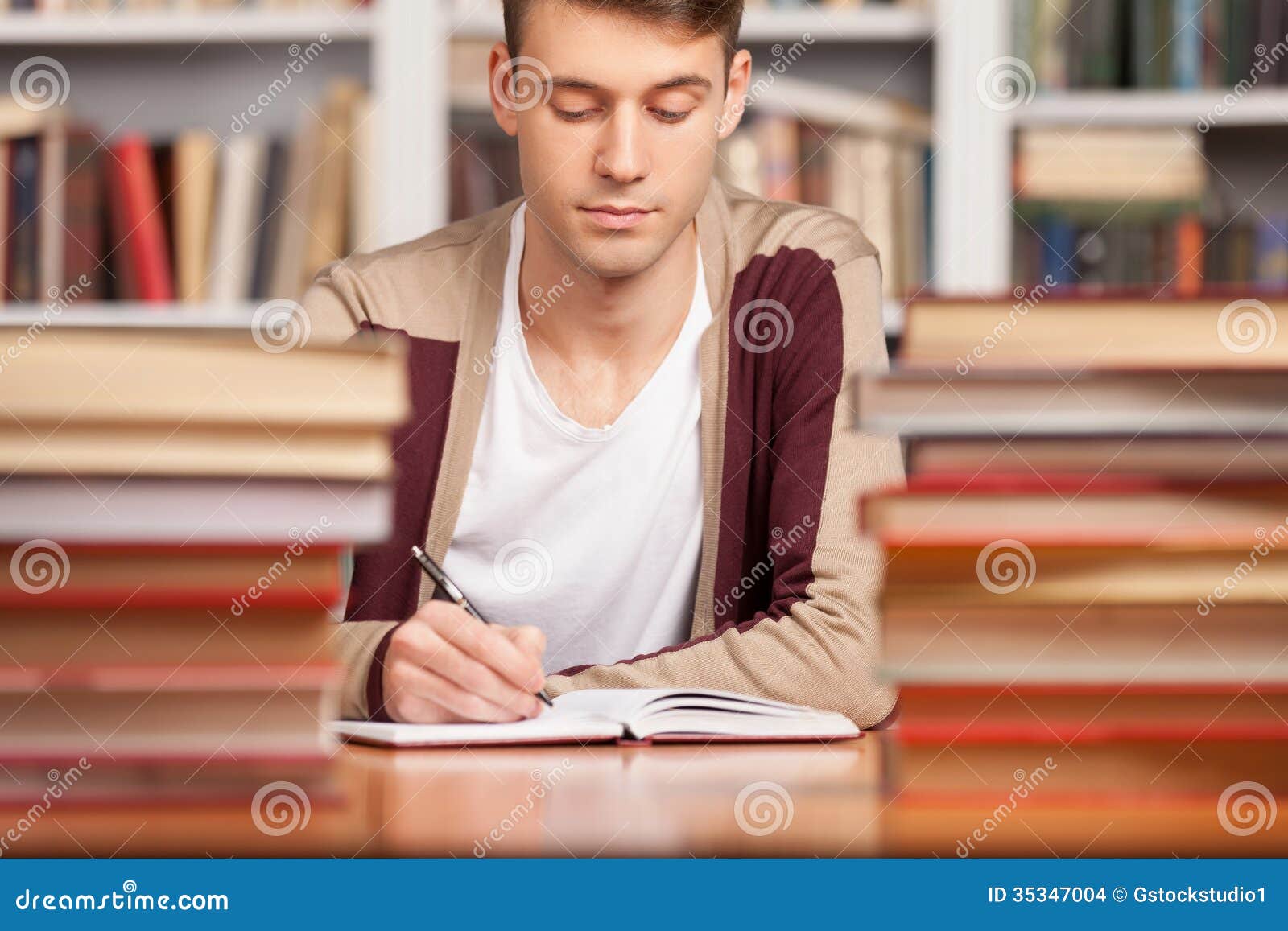 Doing His Research in Library. Stock Photo - Image of male, caucasian ...