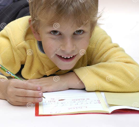 Doing homework stock image. Image of blond, smiles, writing - 269449