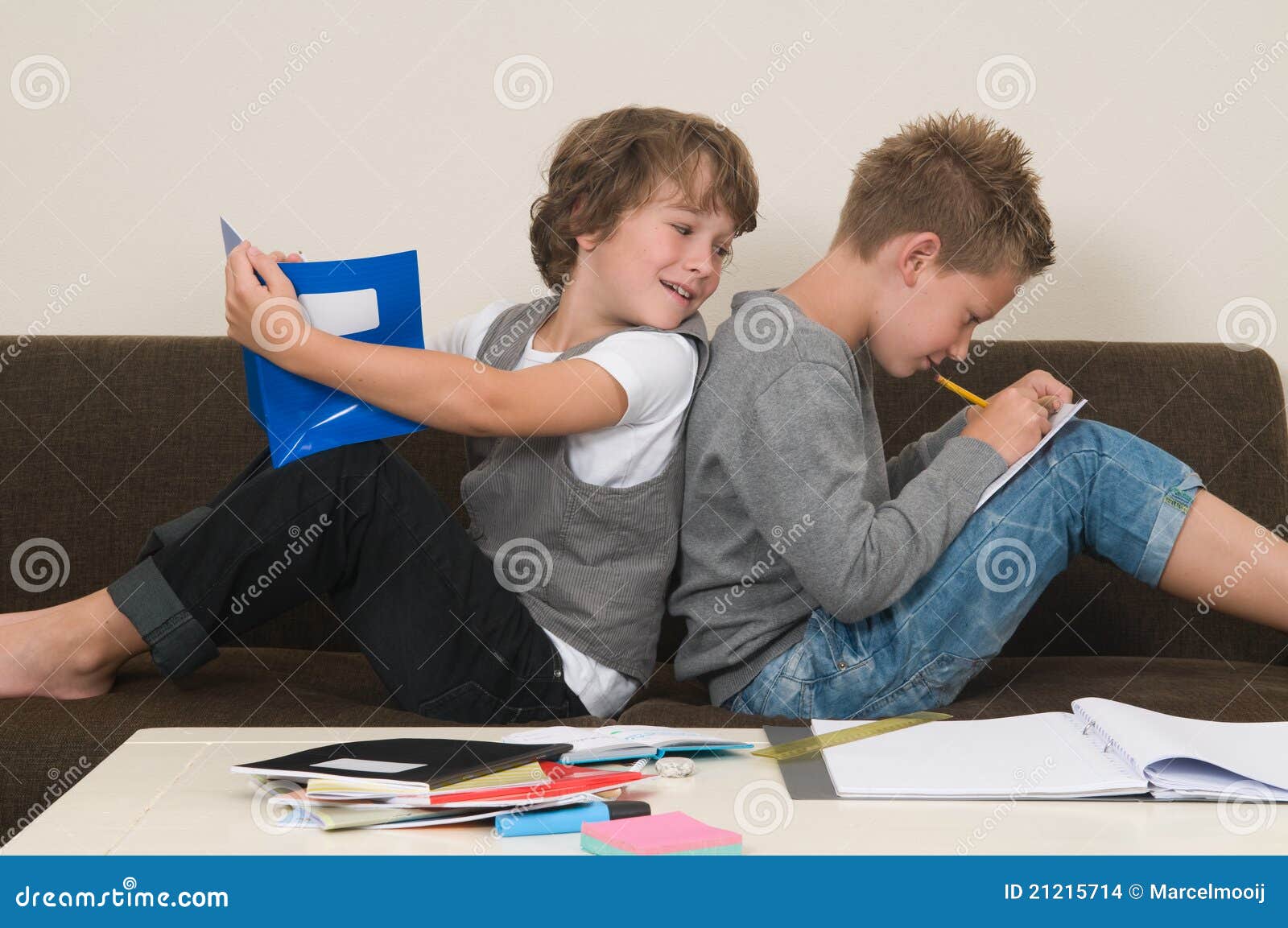 Doing Homework on the Couch Stock Photo - Image of looking, information ...