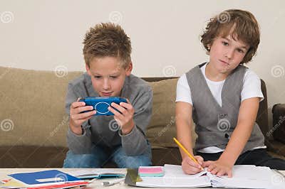 Doing Homework while Gaming Stock Photo - Image of learning, school ...