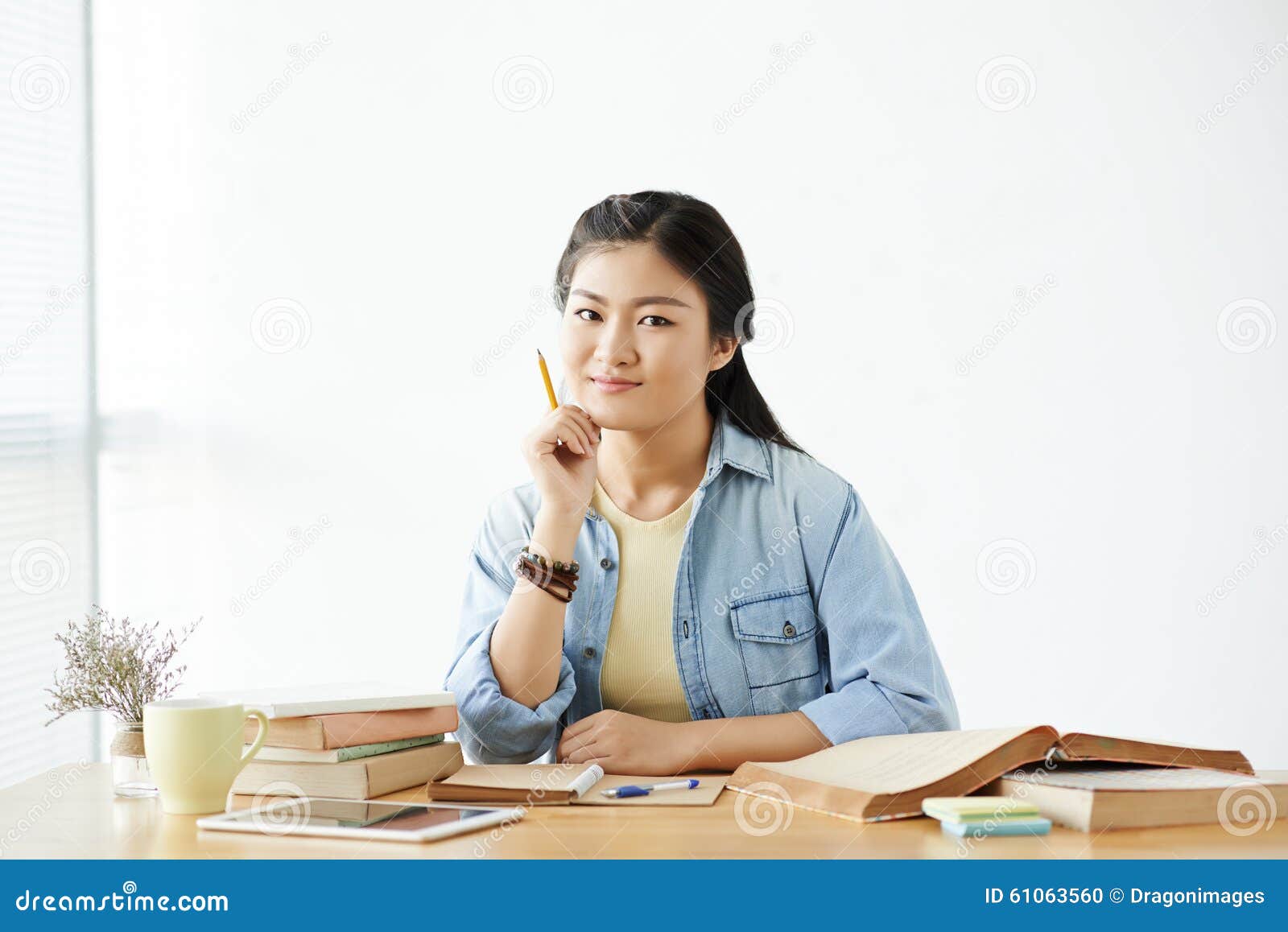 Doing homework stock photo. Image of girl, table, asian - 61063560