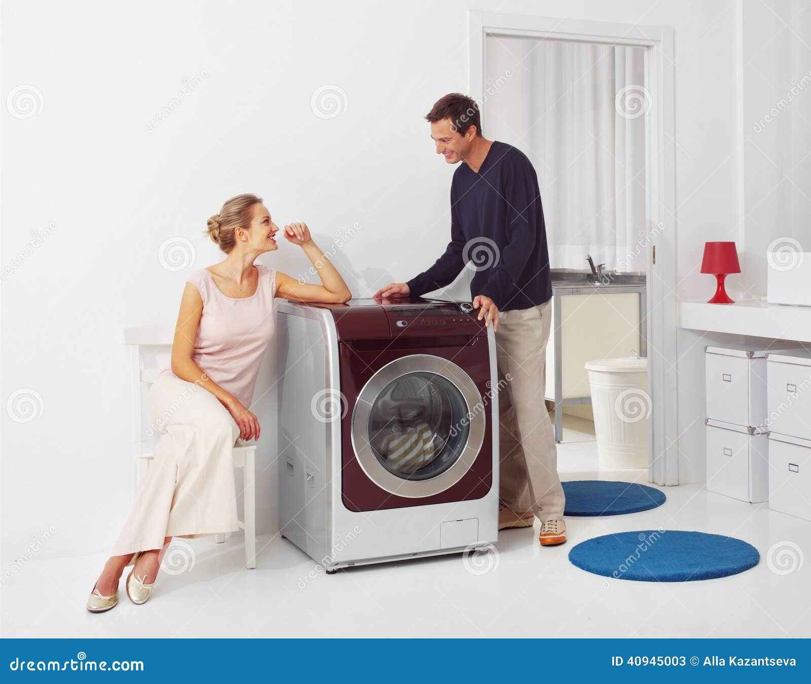Doing laundry at home stock image. Image of indoors, marriage - 40945003