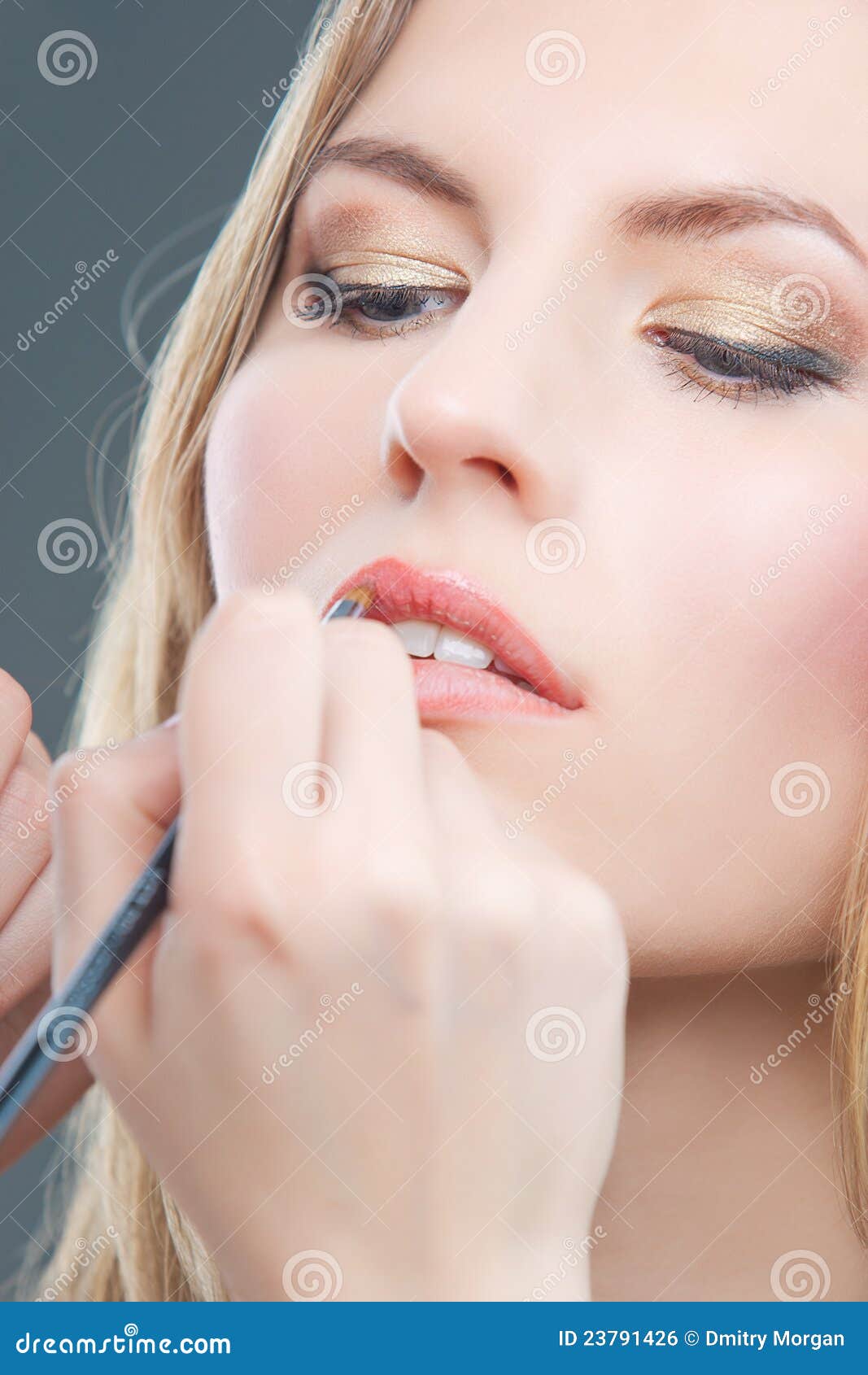 Doing Lips Makeup with a Brush Stock Photo - Image of expression, model ...