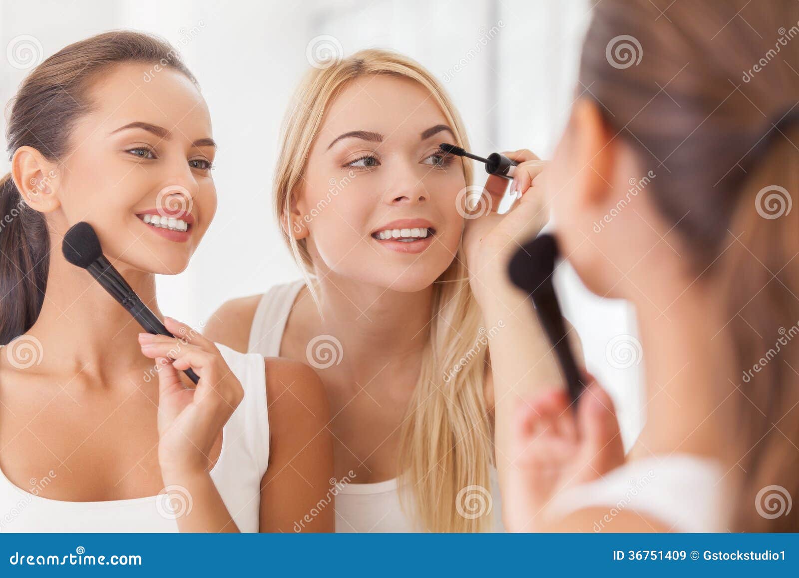 Doing make-up together. stock image. Image of interior - 36751409