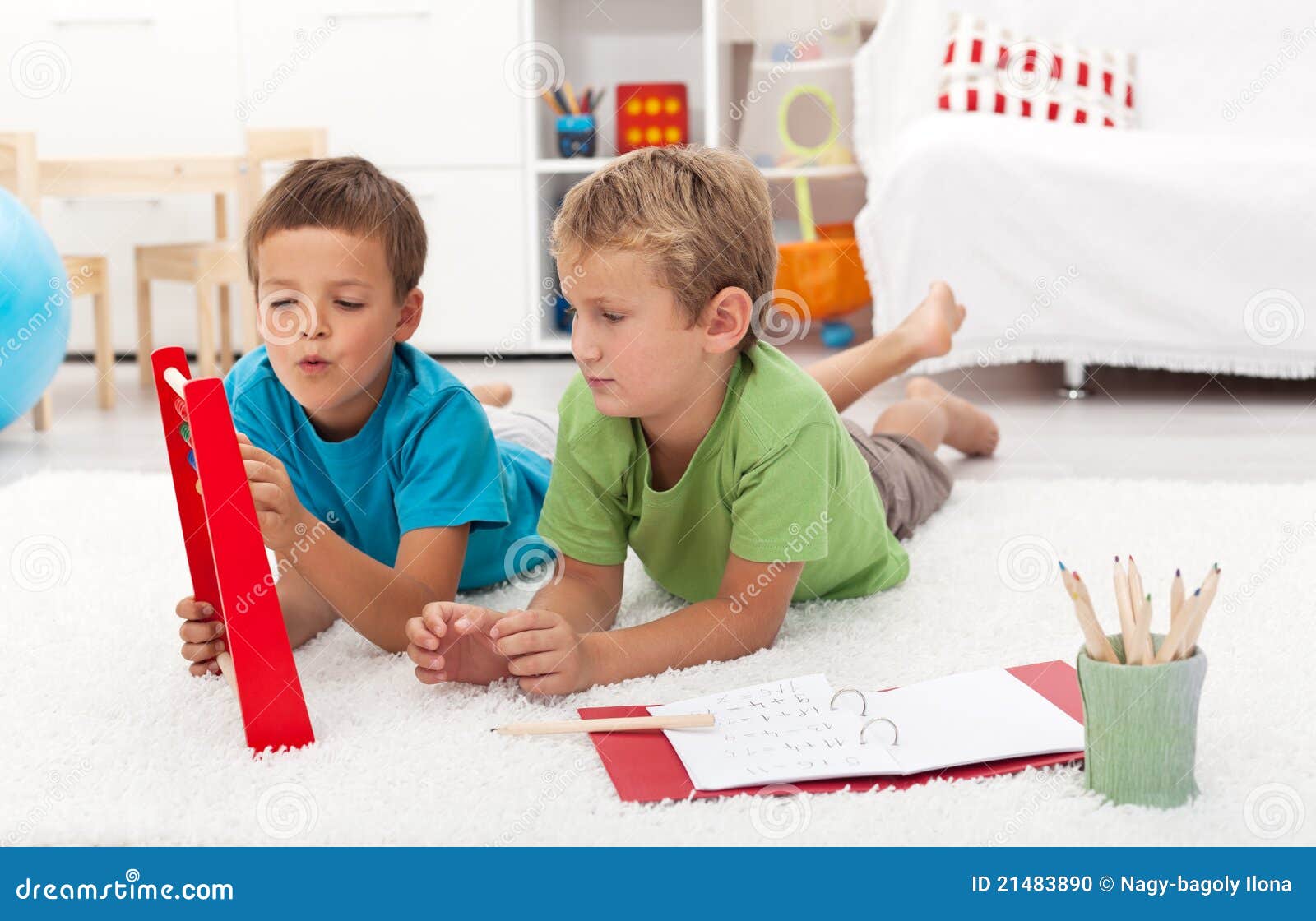 Doing Math Exercises at Home Stock Photo - Image of math, laying: 21483890