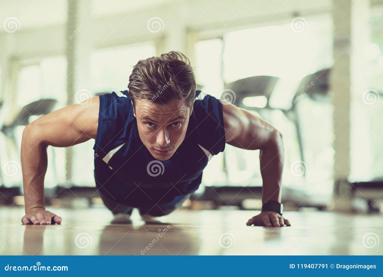Doing Push-ups at Gym stock image. Image of sportswear - 119407791