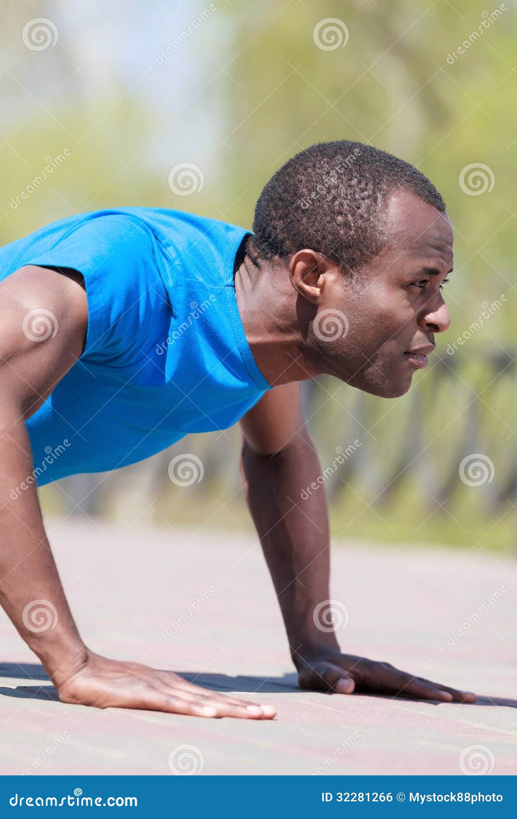 Doing push-ups stock photo. Image of blue, ethnicity - 32281266