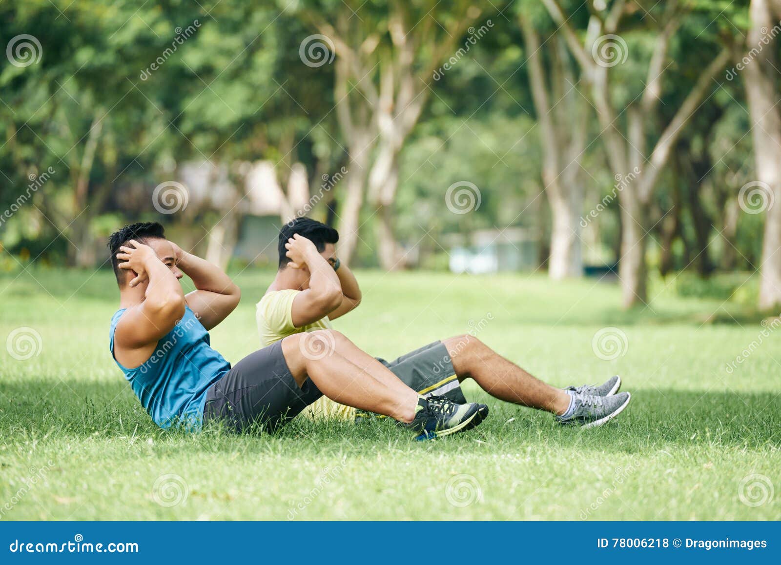 Doing sit-ups stock photo. Image of determined, asian - 78006218