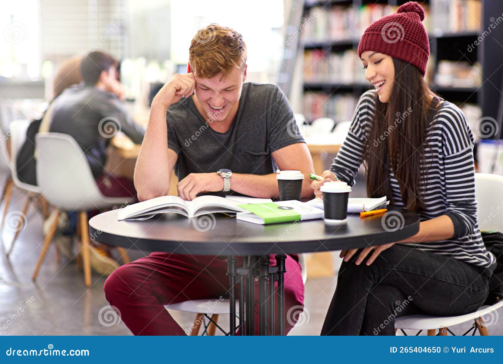 Doing Some Exam Prep with a Friend. Two College Students Studying ...