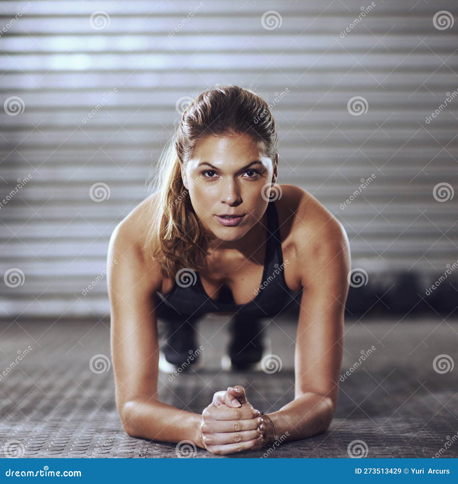 Doing Some Hardcore Core Exercises. a Young Woman Doing a Plank Exercise at the Gym. Stock Image ...