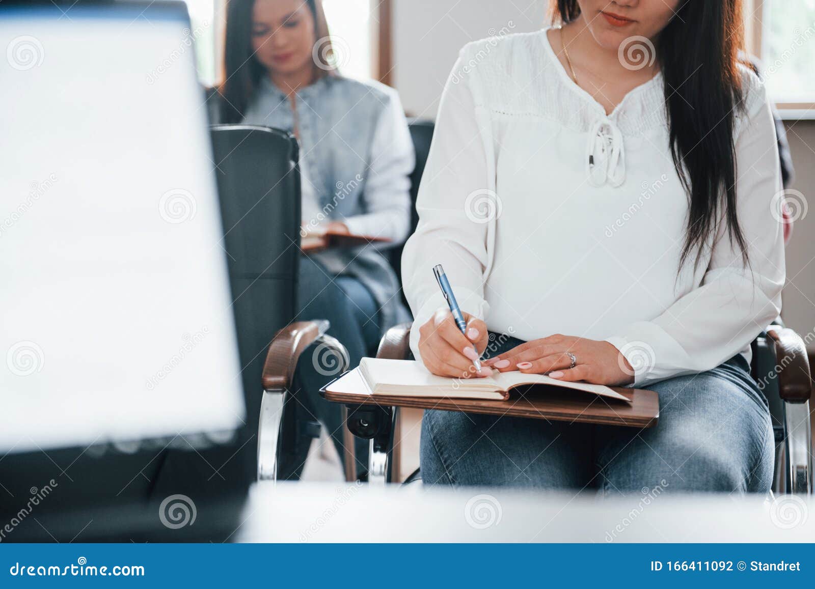 Doing Some Notes. Group of People at Business Conference in Modern ...