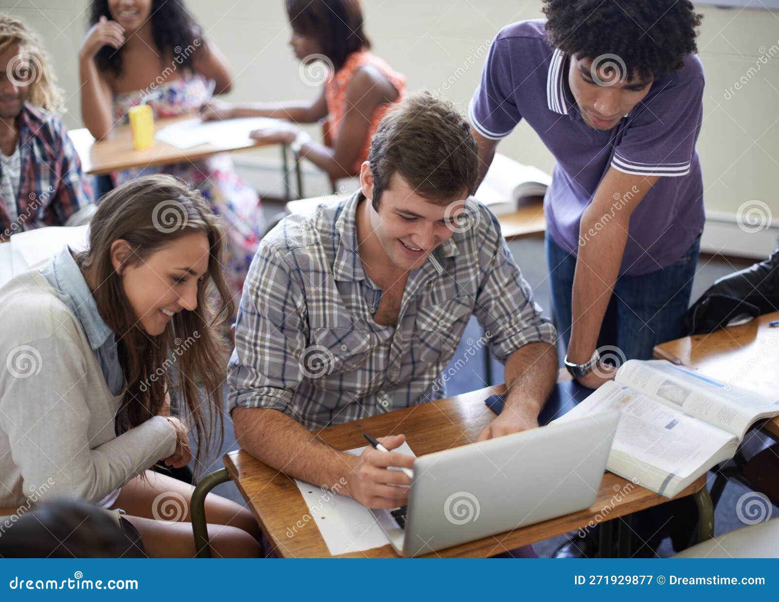 Doing Some Online Research. a Group of University Students Working on ...