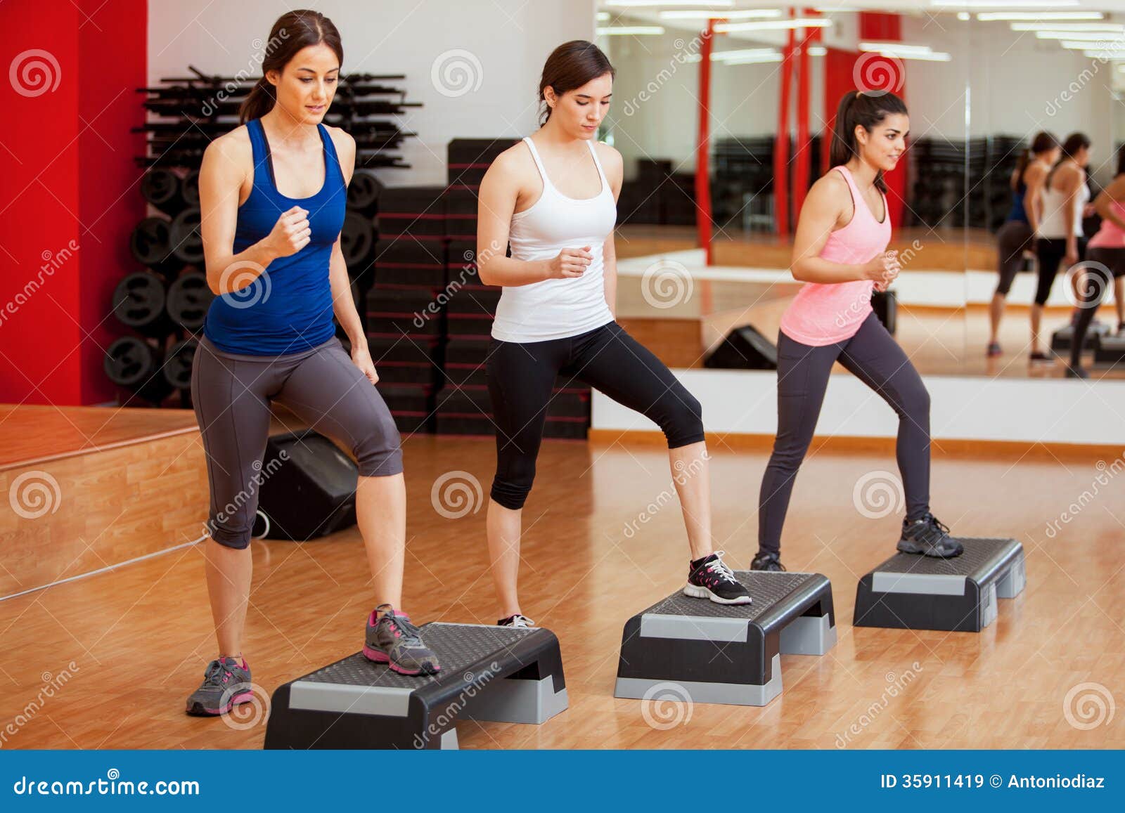 Doing some step aerobics stock image. Image of adult - 35911419