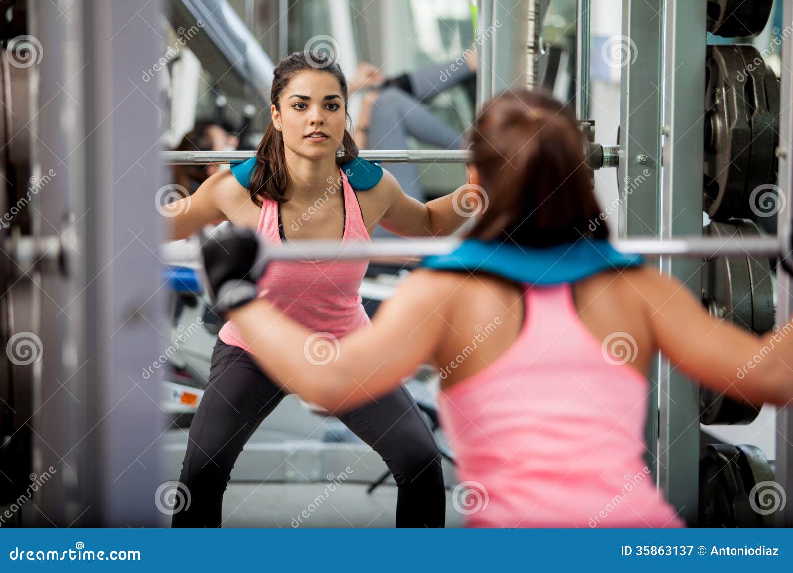 Doing Squats with a Barbell Stock Image - Image of lifestyle, athletic ...