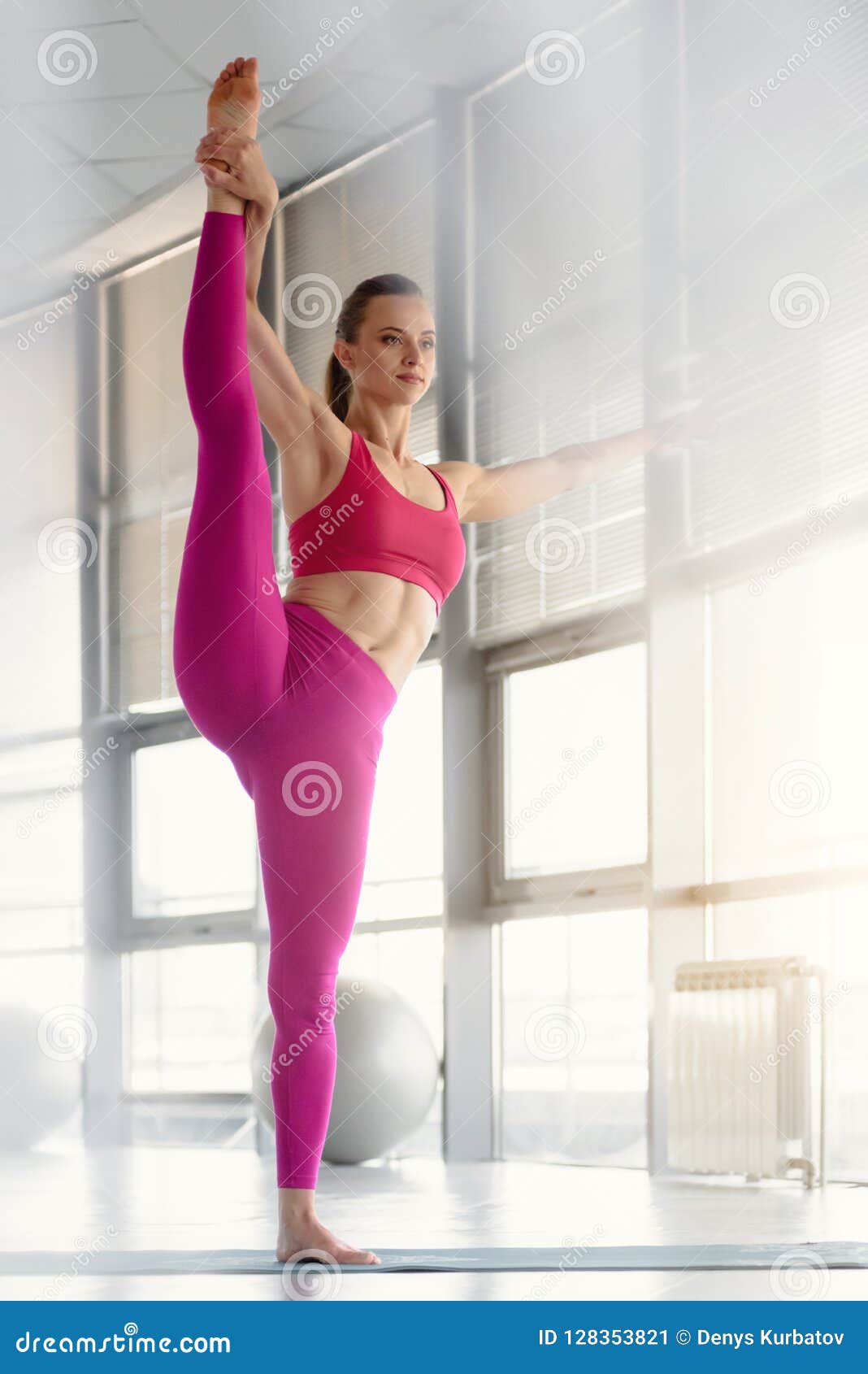 Doing vertical split stock image. Image of girl, raised - 128353821
