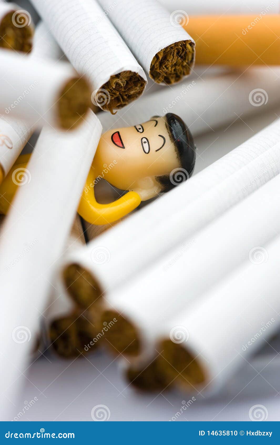 Doll on cigarettes stock photo. Image of concept, health - 14635810