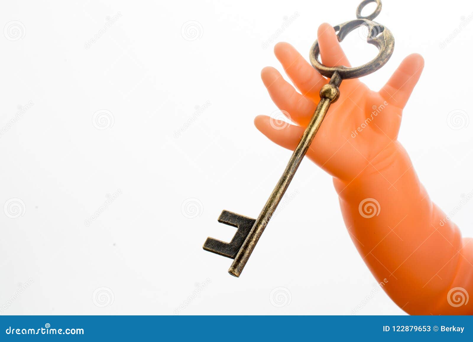 Doll holding a key stock image. Image of security, house - 122879653