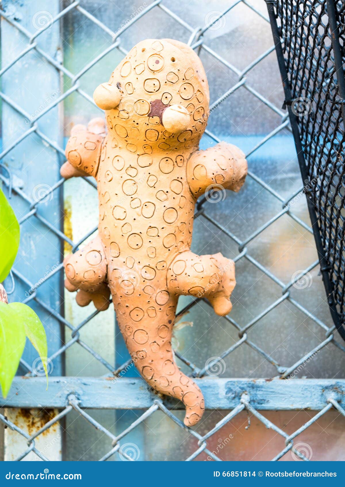 Doll Lizard Clay on Wire Fence Stock Photo - Image of cute, decor: 66851814