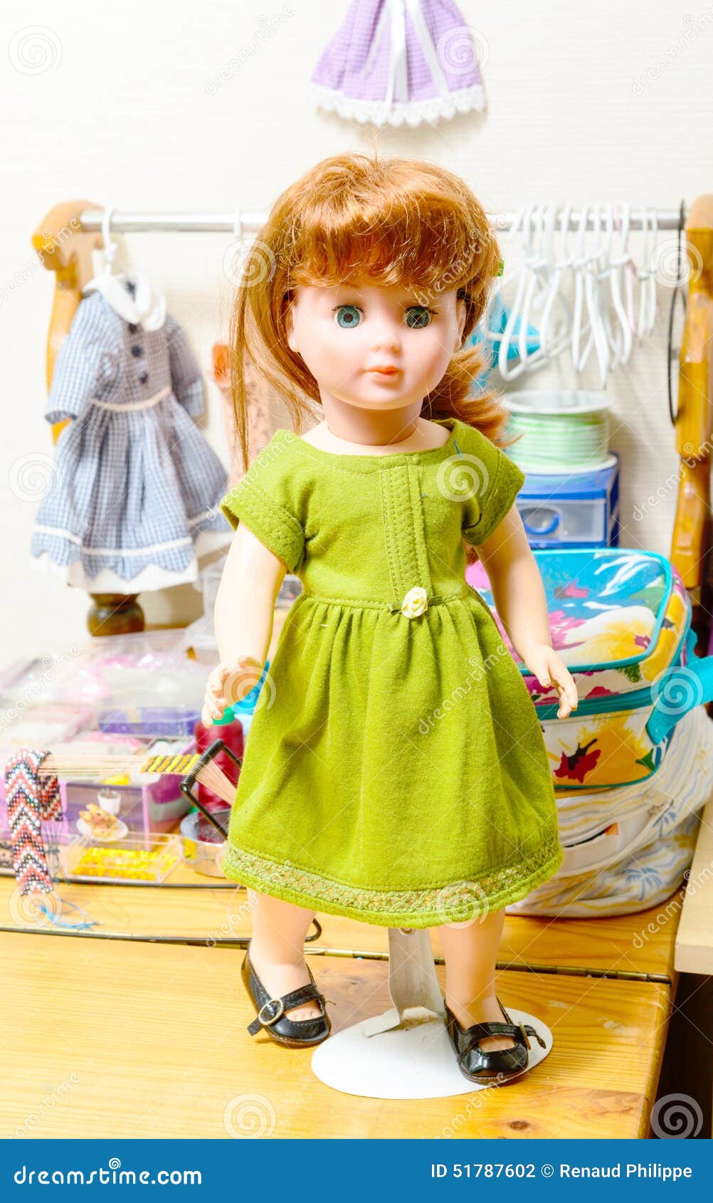 Doll with Red Hair and Dresses Stock Photo - Image of young, dress ...