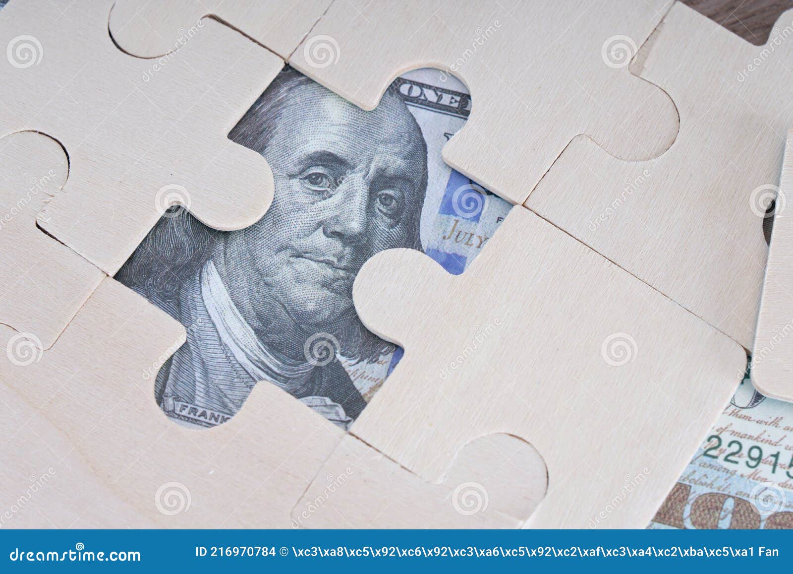 Dollar Bill Exposed in Jigsaw Puzzle on the Table Stock Photo - Image ...