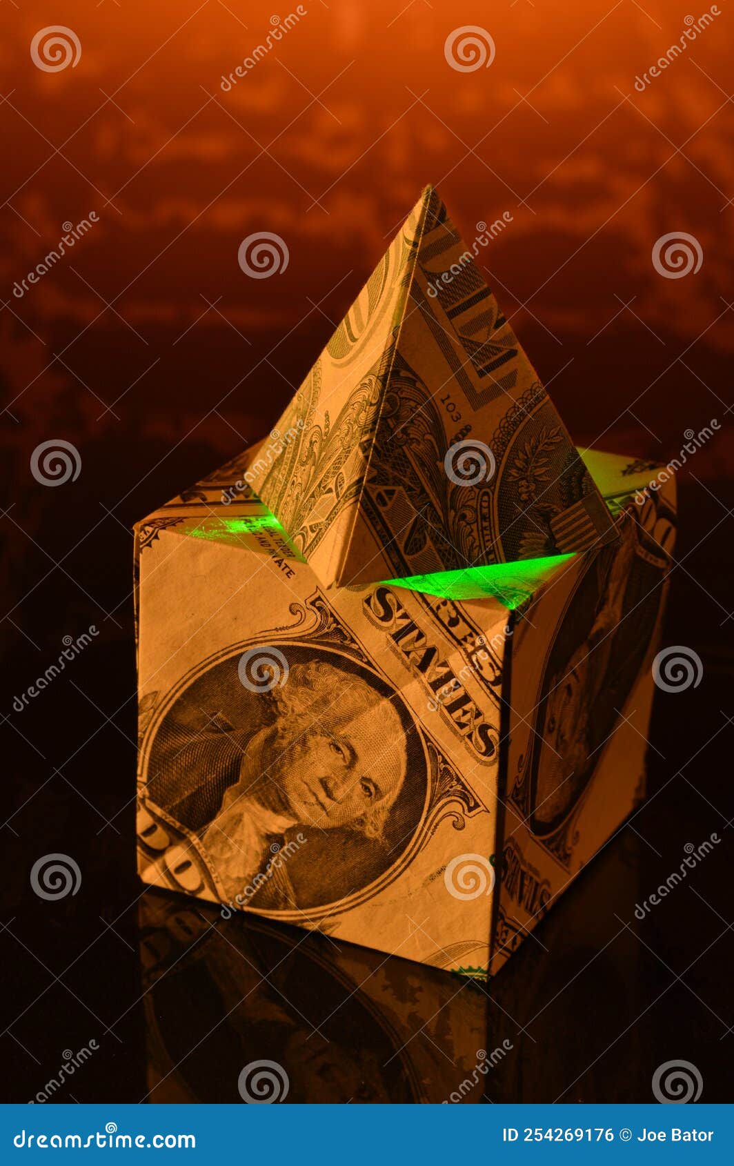 Dollar Bill Pyramid Resting Atop a Cube Made of Dollar Bills Stock ...