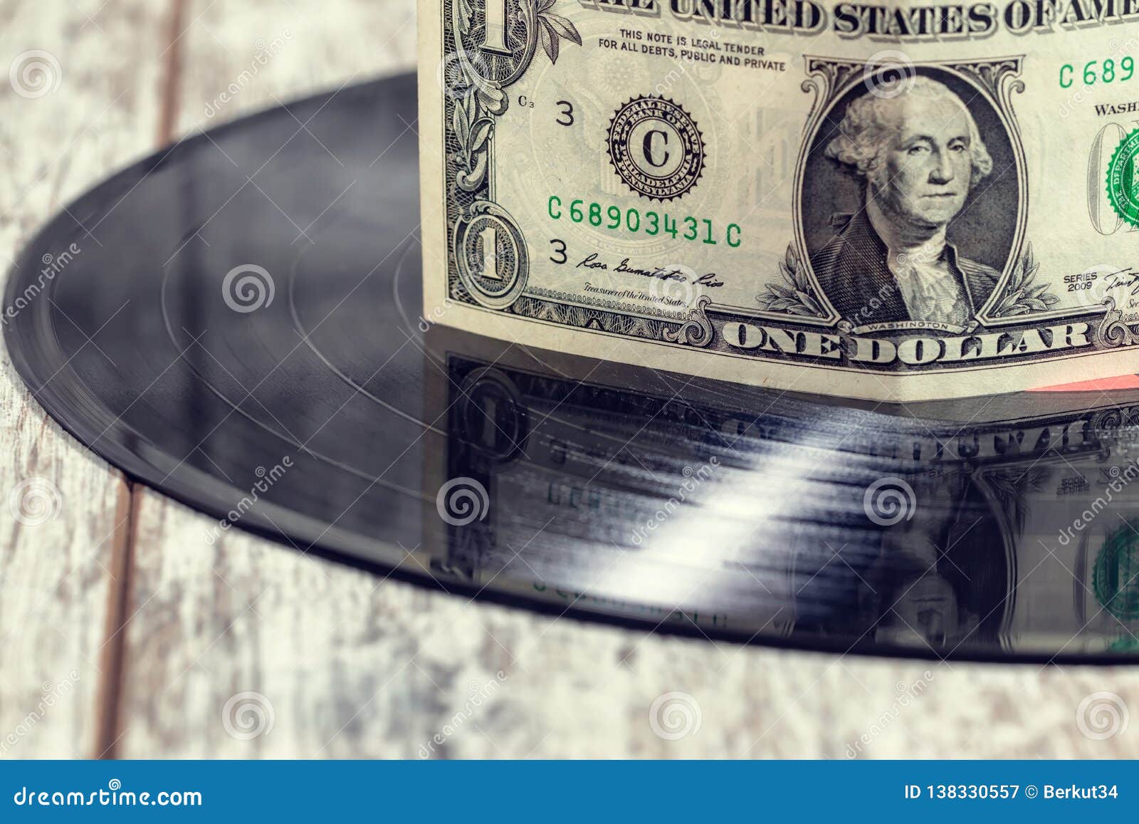 A Dollar Bill Stands on an Old Vinyl Record with Music Stock Image ...