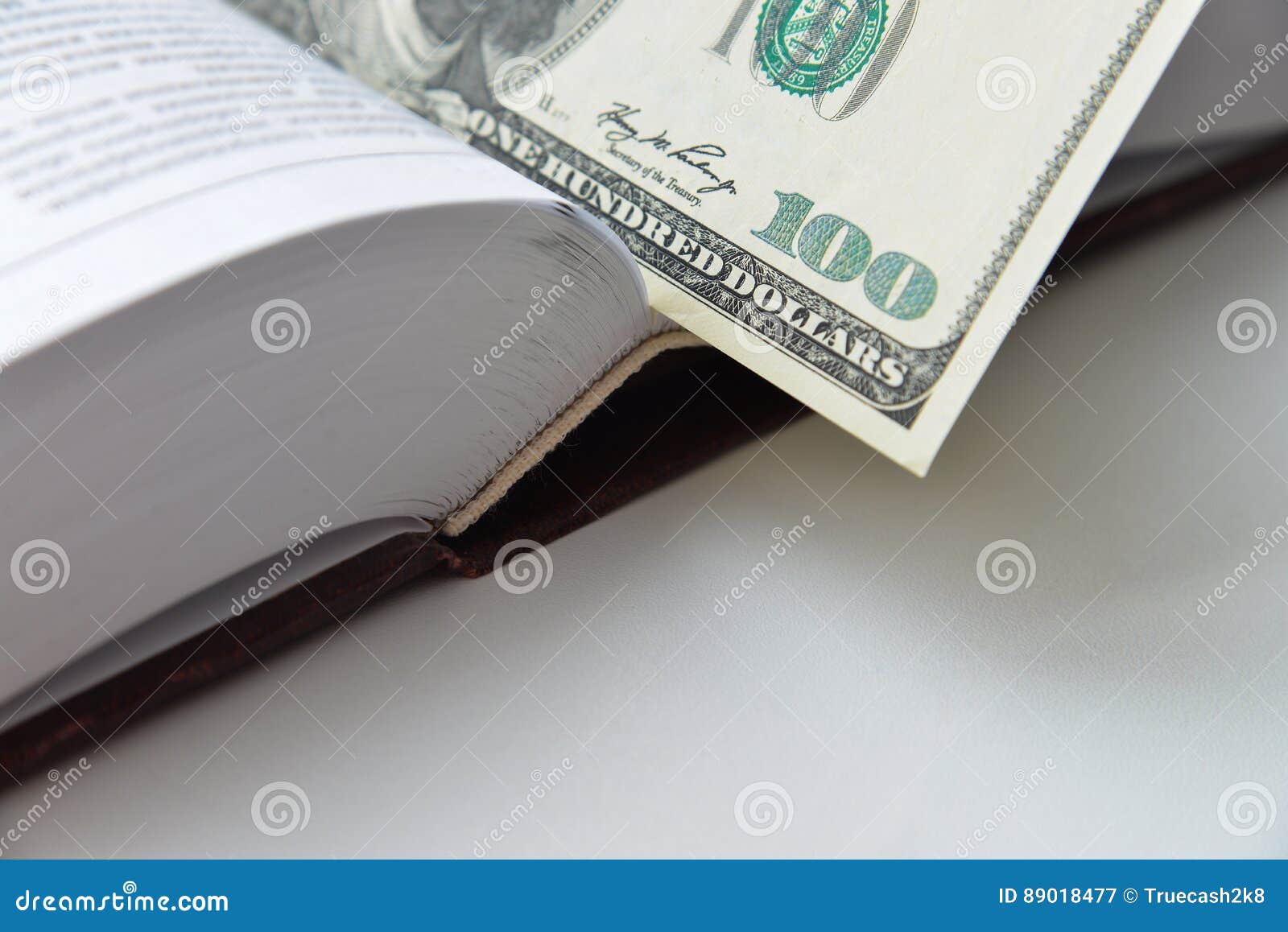 Dollar Bill Used As a Bookmark in a Book Stock Image - Image of ...