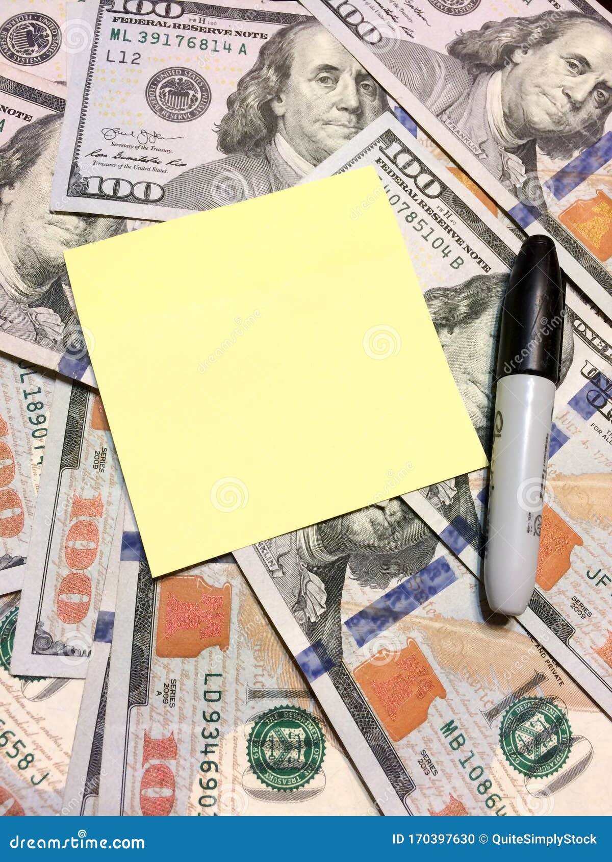 Dollar Bills Cash with Post it Note and Sharpie Vertical Stock Photo ...