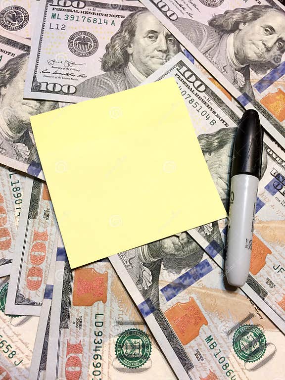 Dollar Bills Cash with Post it Note and Sharpie Vertical Stock Photo ...
