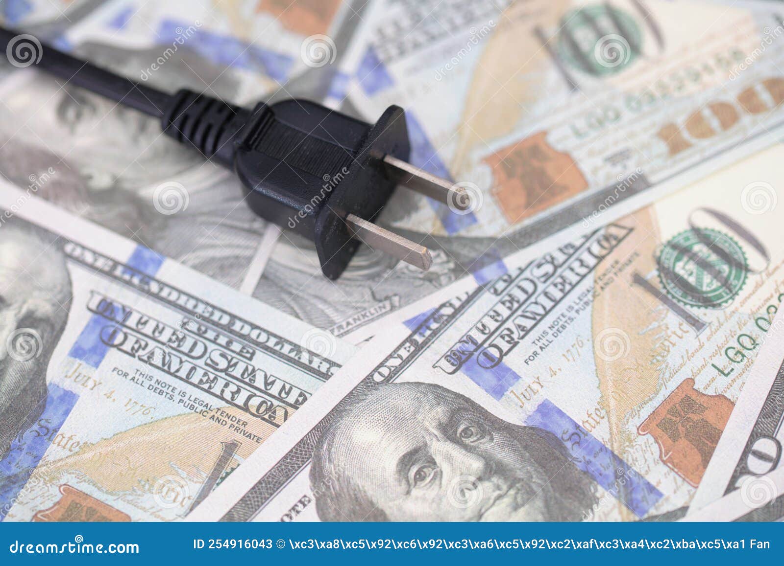 Dollar Bills and Coins and an Electric Plug Stock Image - Image of ...