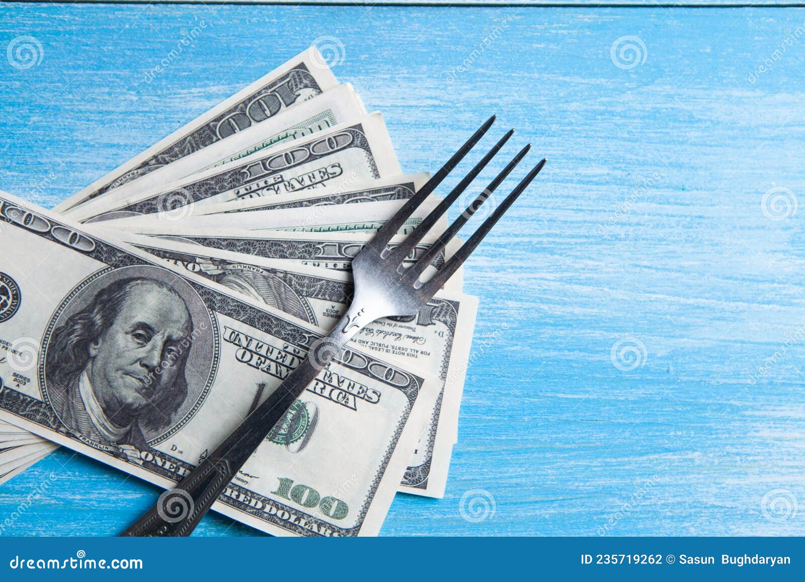 Dollar Bills and Fork on the Table Stock Photo - Image of finance ...