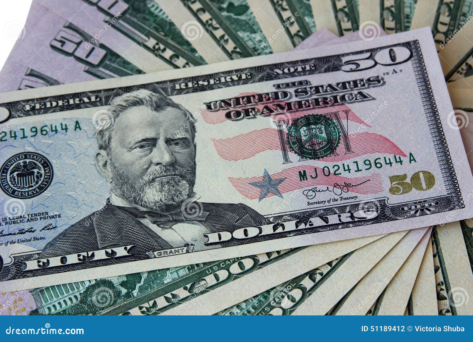 Dollar Bills Lying Face with a Portrait of the President Stock Photo ...