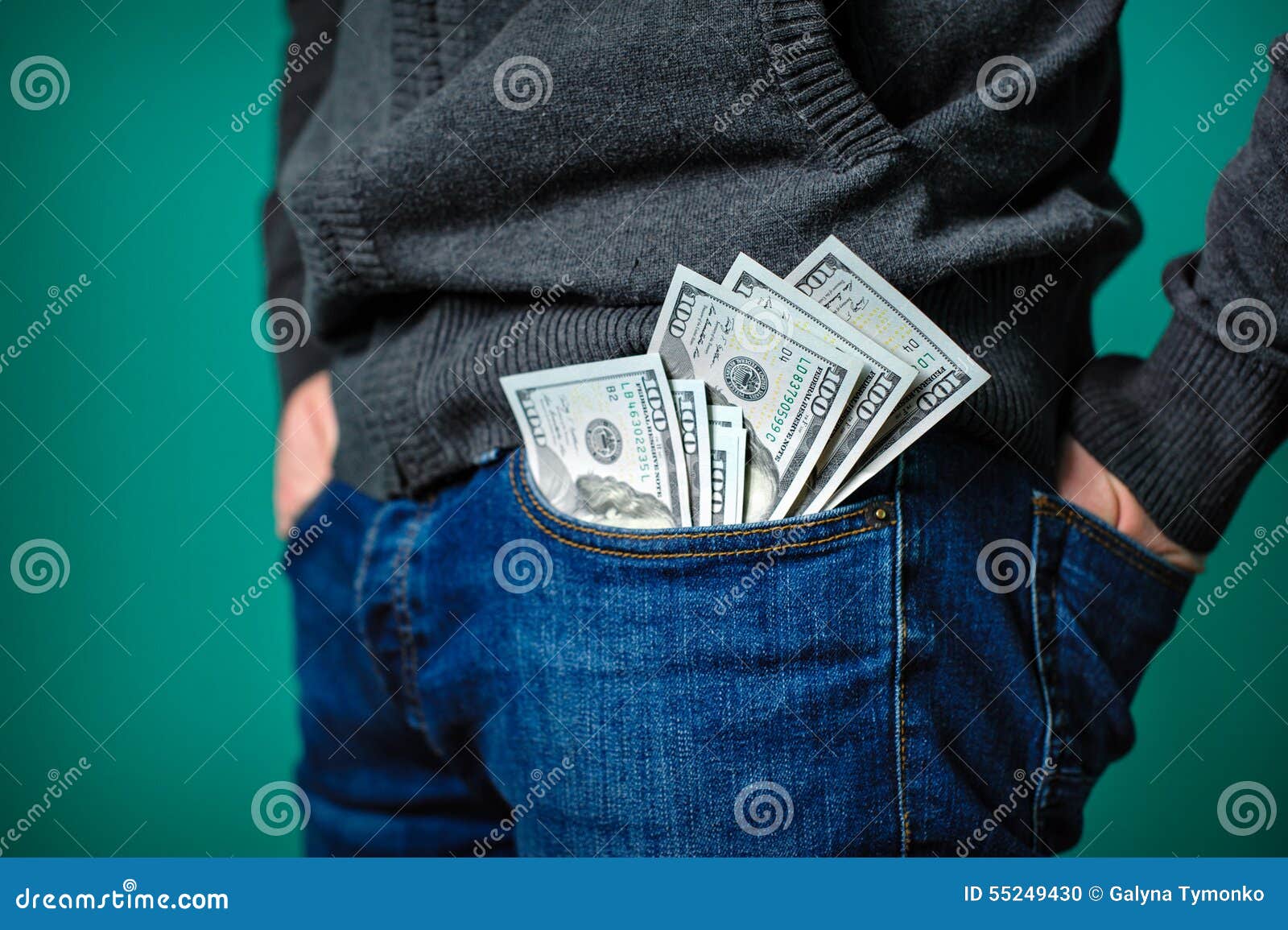Dollar Bills Sticking Out of the Pocket of a Man Stock Photo - Image of ...