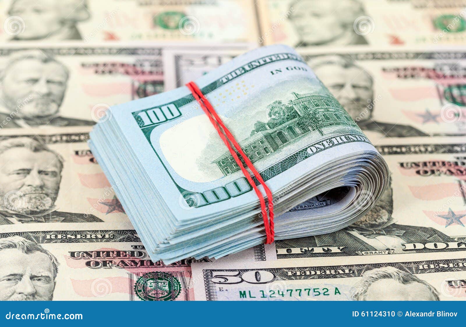 Dollar Bills Wrapped by Rubber Lying Over Banknotes Stock Photo - Image ...