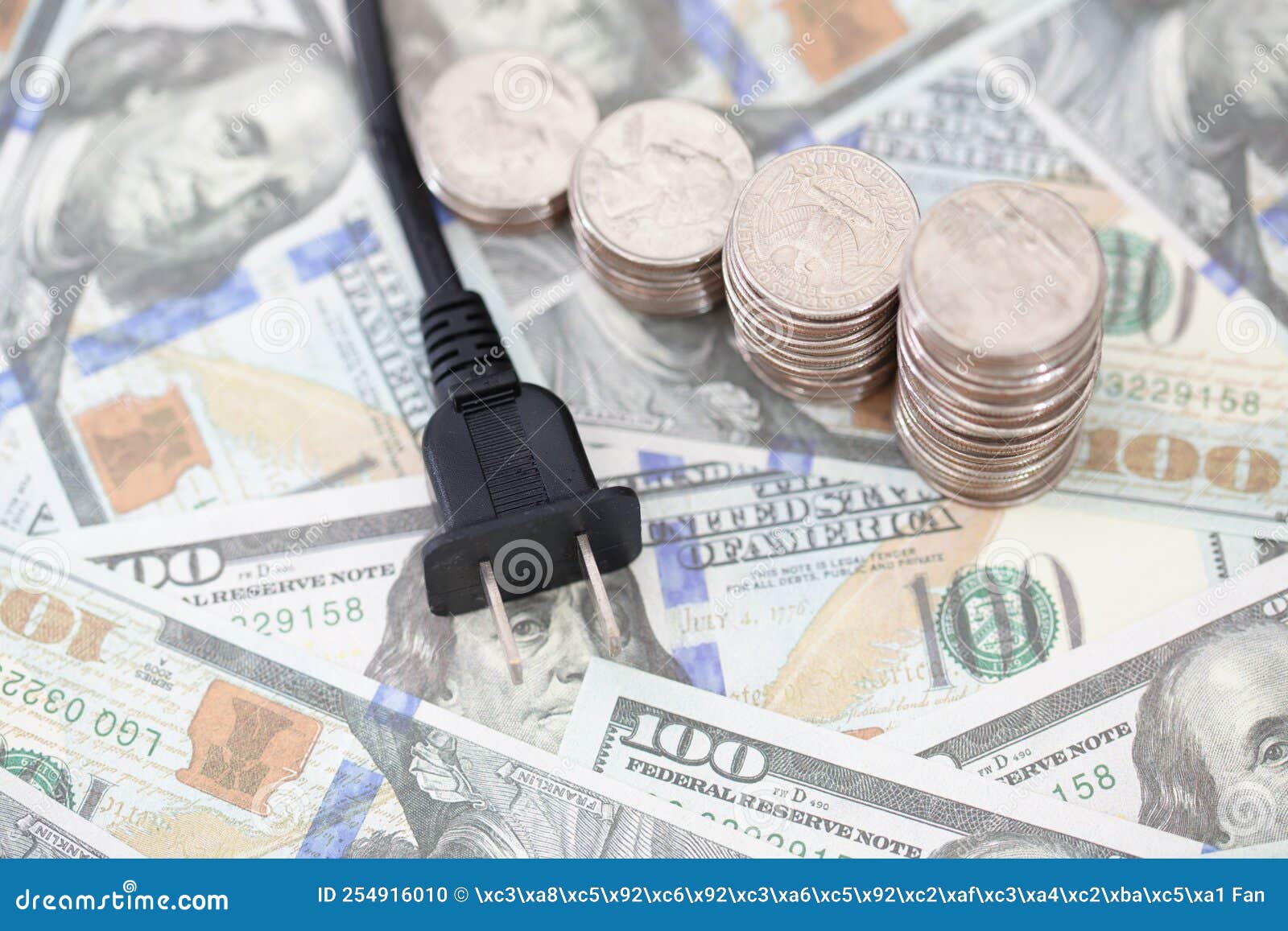 Dollar Coins and Plug on Dollar Bills Stock Photo - Image of dollars ...