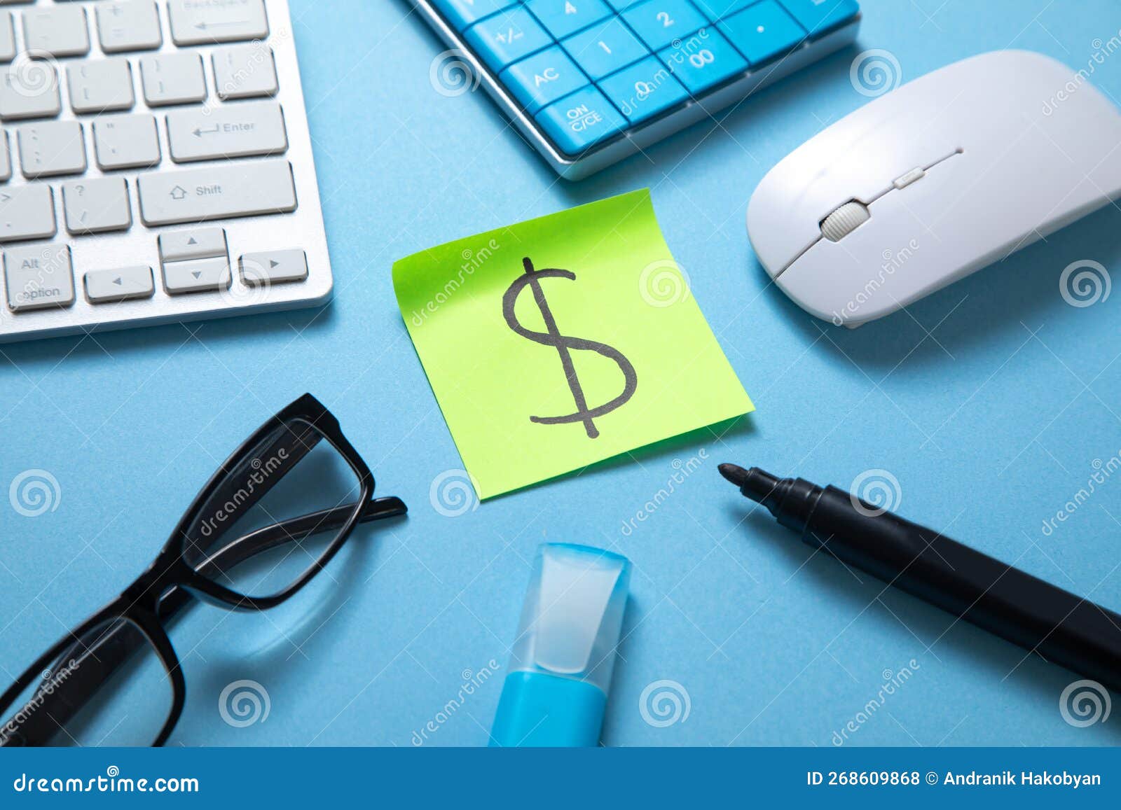 Dollar Symbol on the Sticky Note with a Calculator and Other Objects ...