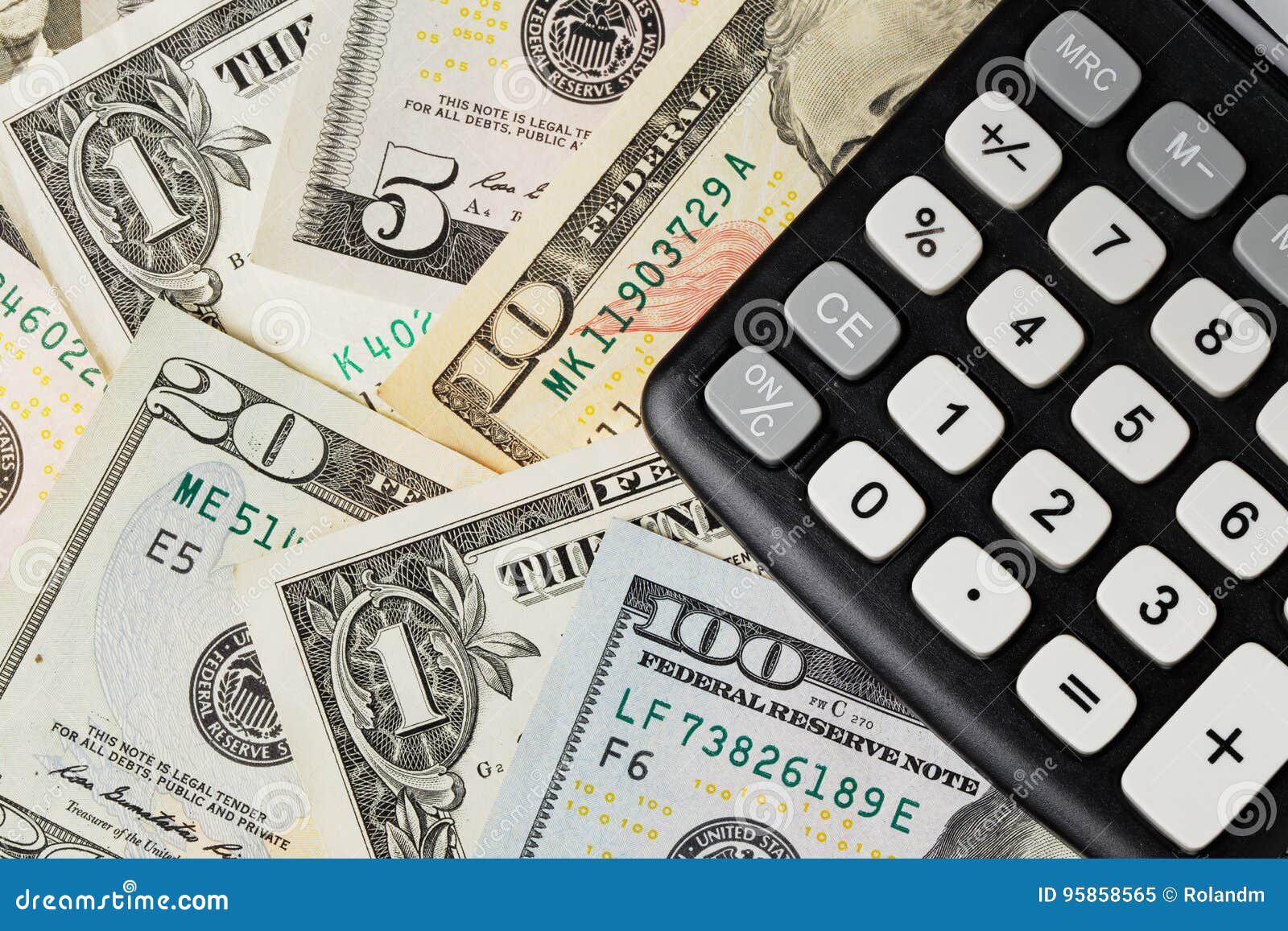 Dollars and a calculator stock image. Image of cash, currency - 95858565