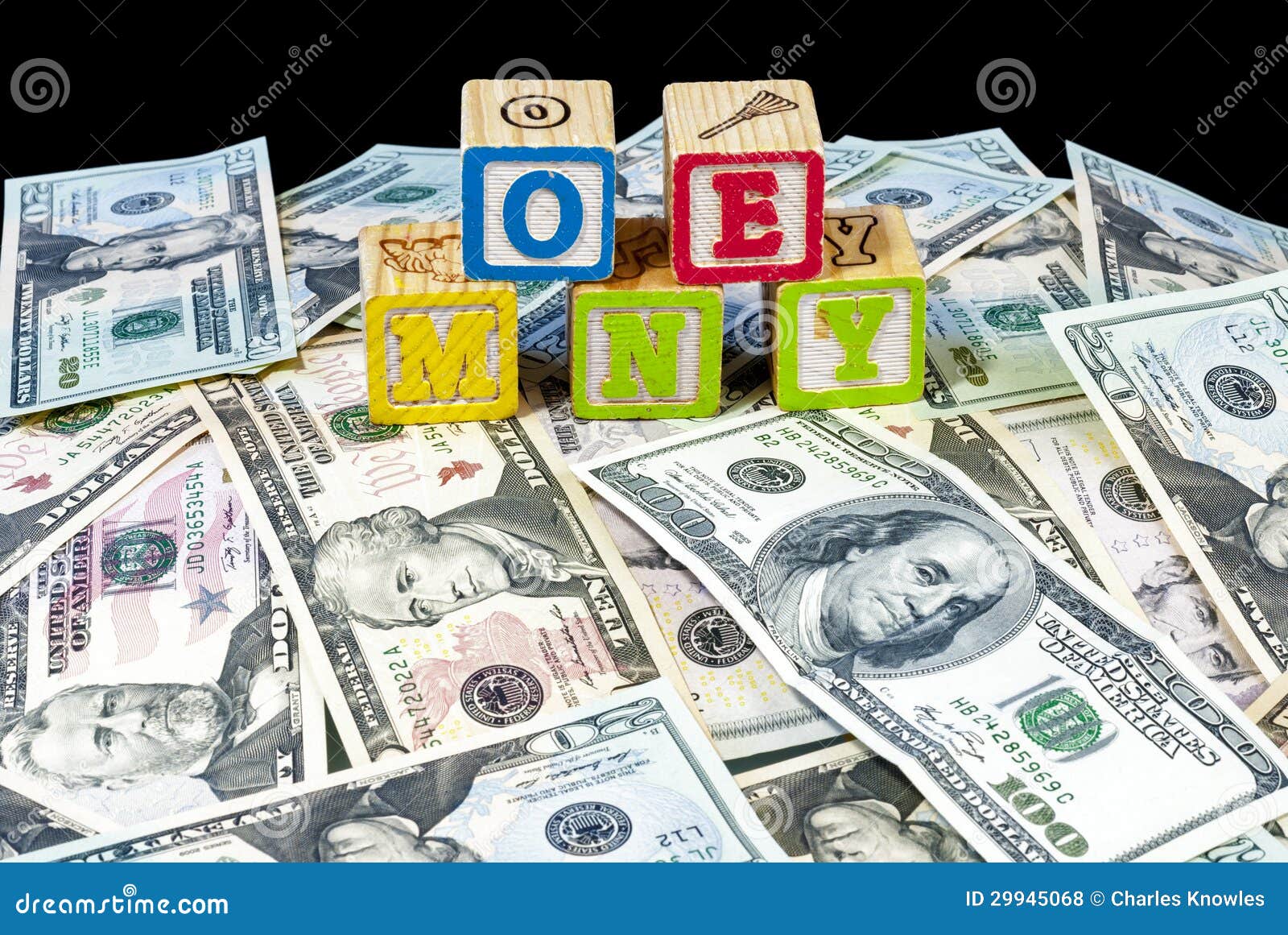 Pile of Cash with Wood Blocks that Spell Money Stock Photo - Image of ...