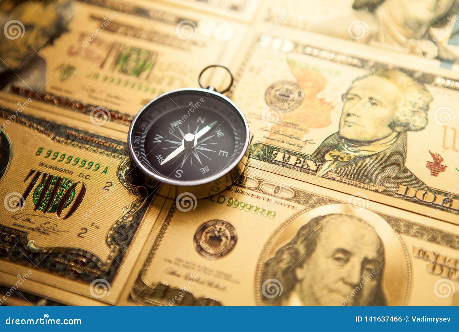 Dollars and Compass. Concept on a Financial Theme Stock Photo - Image ...