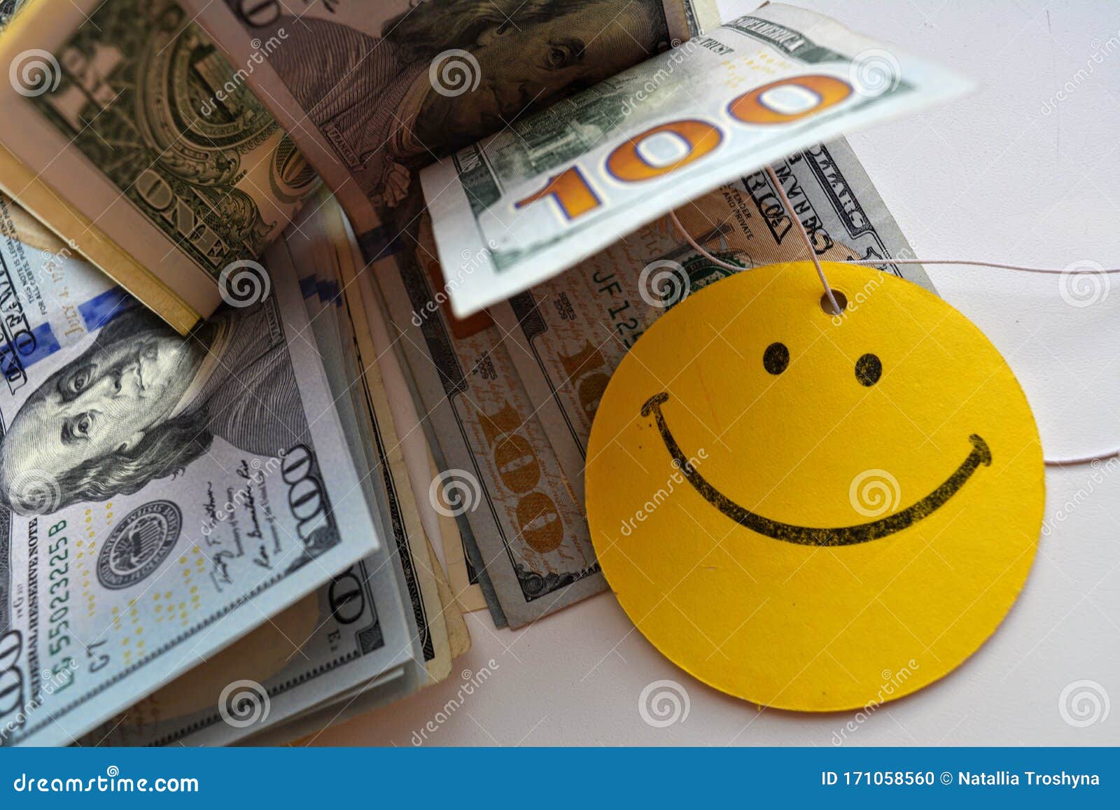 Dollars Money and Yellow Smile on a White Background Stock Photo ...