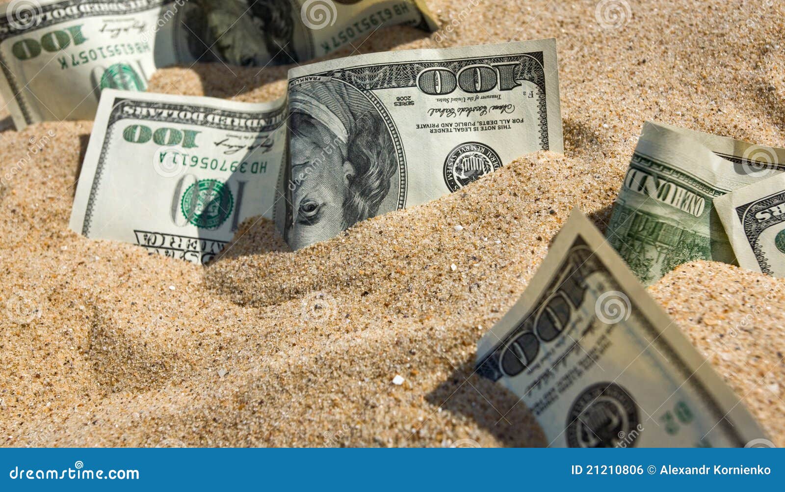 Dollars in sand on a beach stock photo. Image of wealth - 21210806