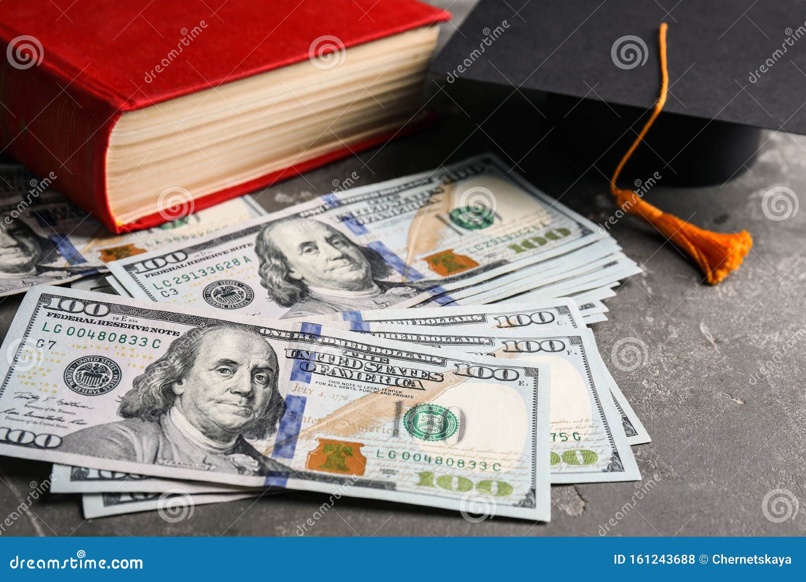 Dollars, Student Graduation Hat and Book. Tuition Payments Concept ...