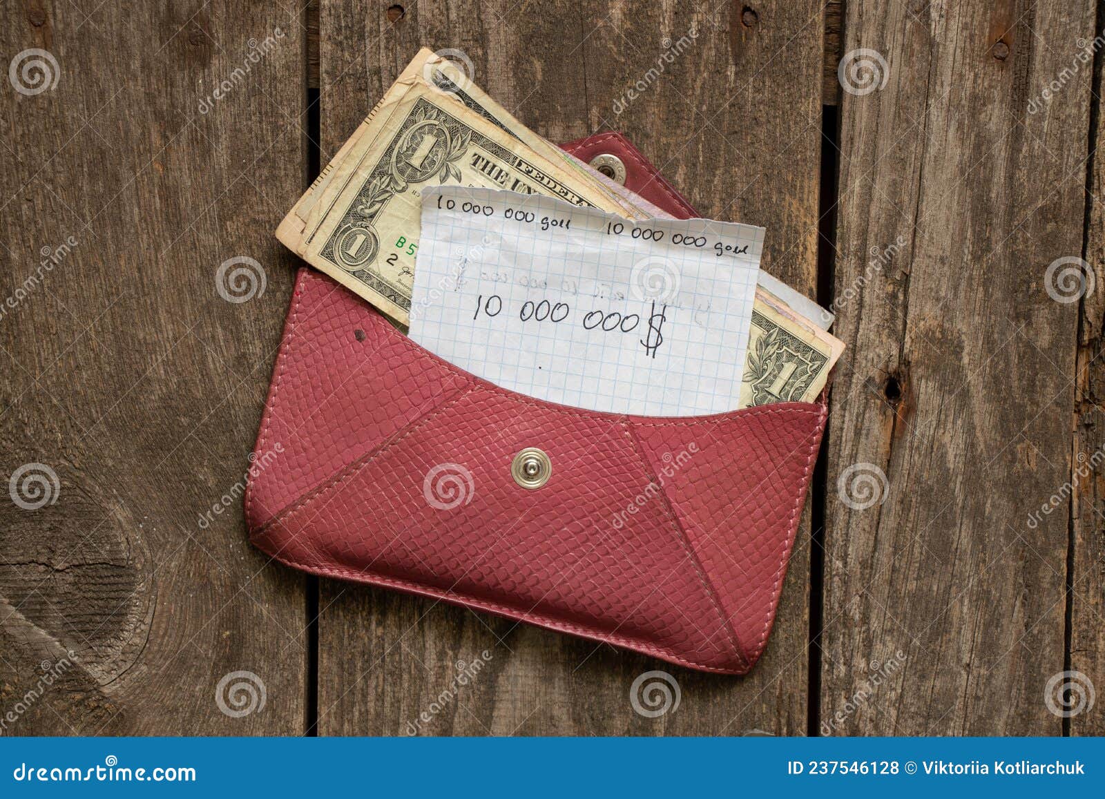 Dollars in Wallet and One Million Dollar Handwritten Check on the Table ...