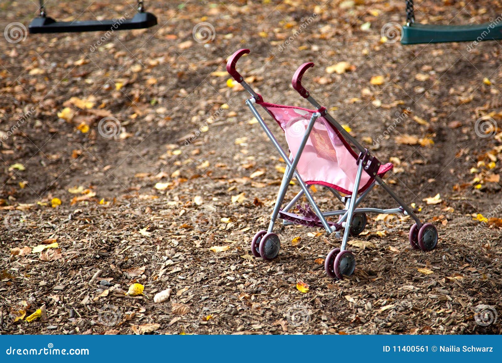 Dolls Pram on Empty Playground Stock Image - Image of autumn, plastic ...