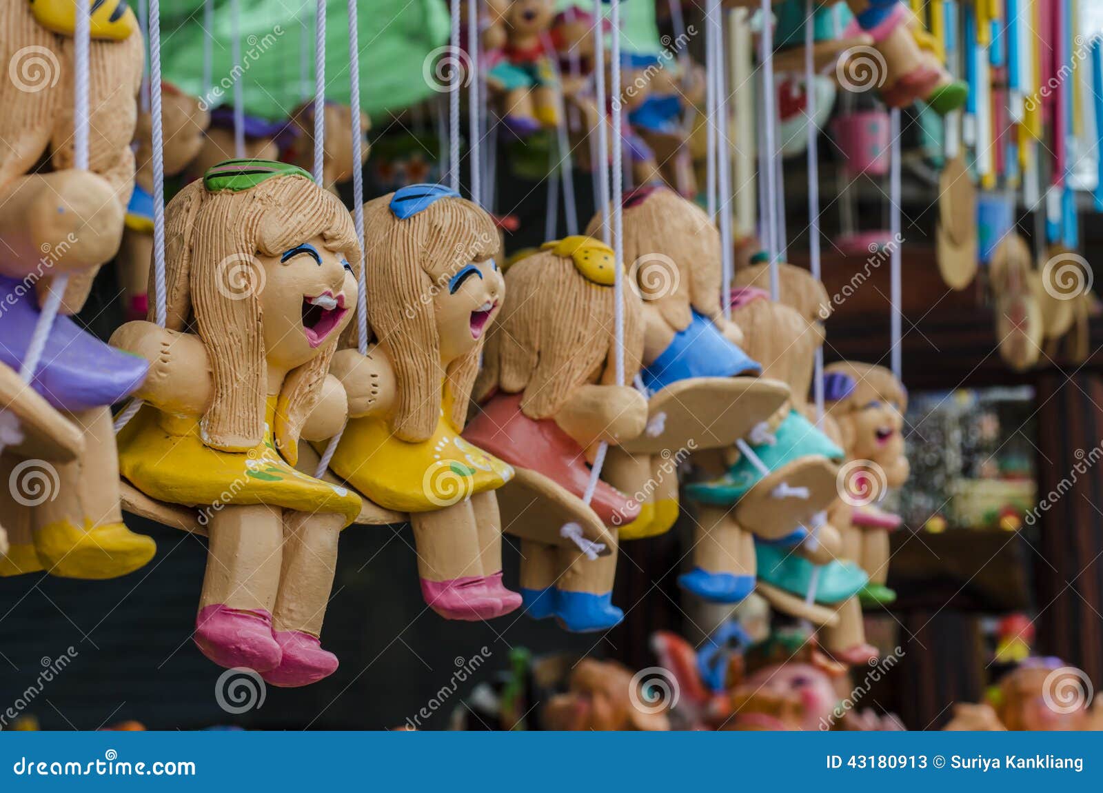 Dolls on rope swing stock image. Image of rope, swing - 43180913