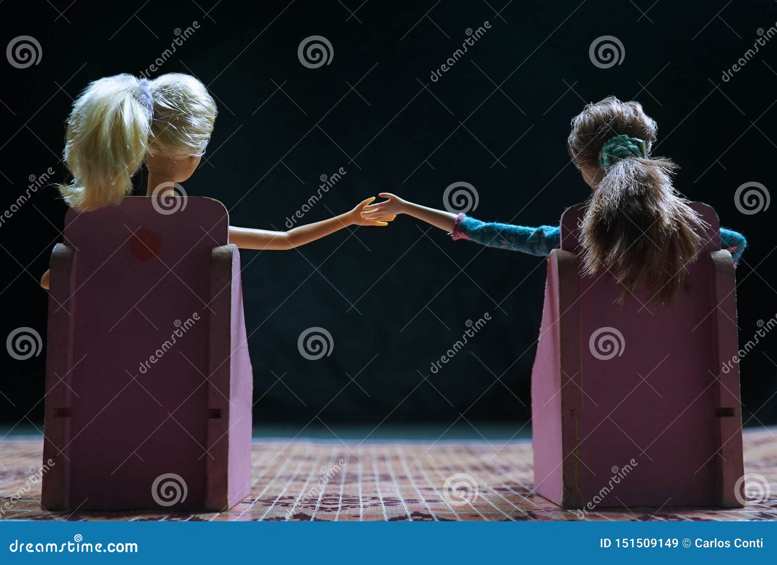 Dolls Sitting on the Back Taken from the Hand Stock Image - Image of ...