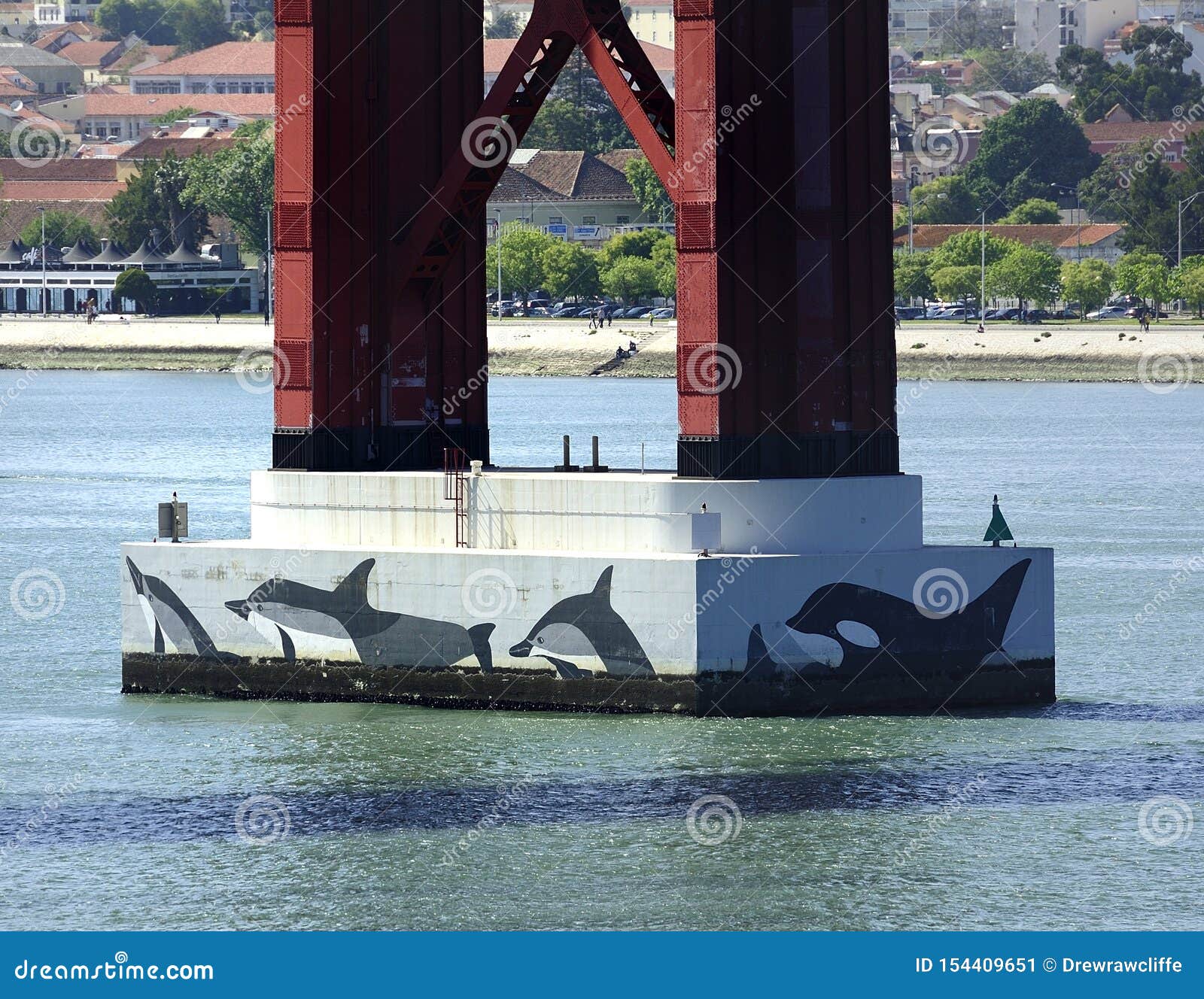 Dolphins and the 25th April Bridge Editorial Photo - Image of concrete ...