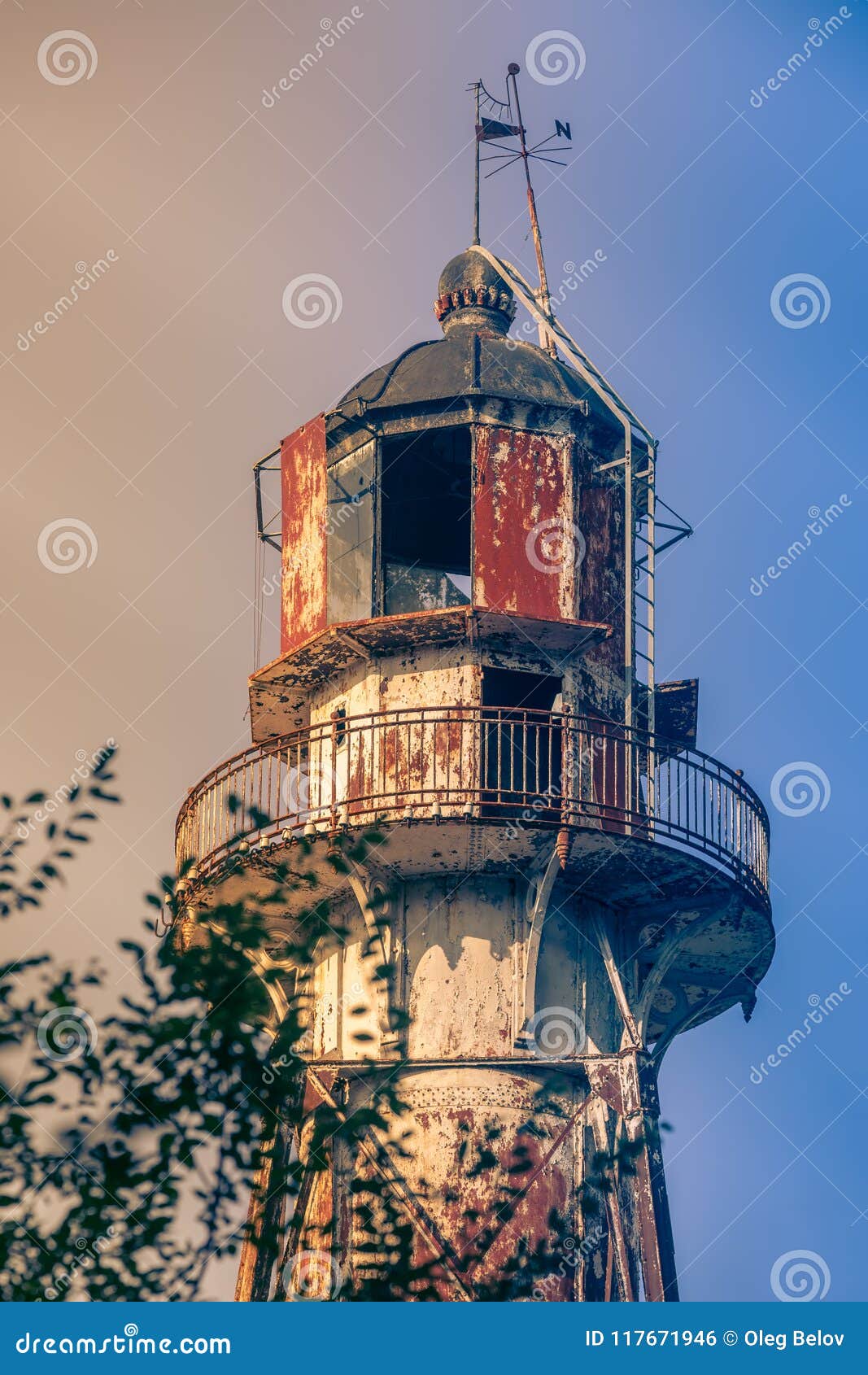 Dome of an Old Rusty Metal Lighthouse in the Sun Rays. Toned Image ...