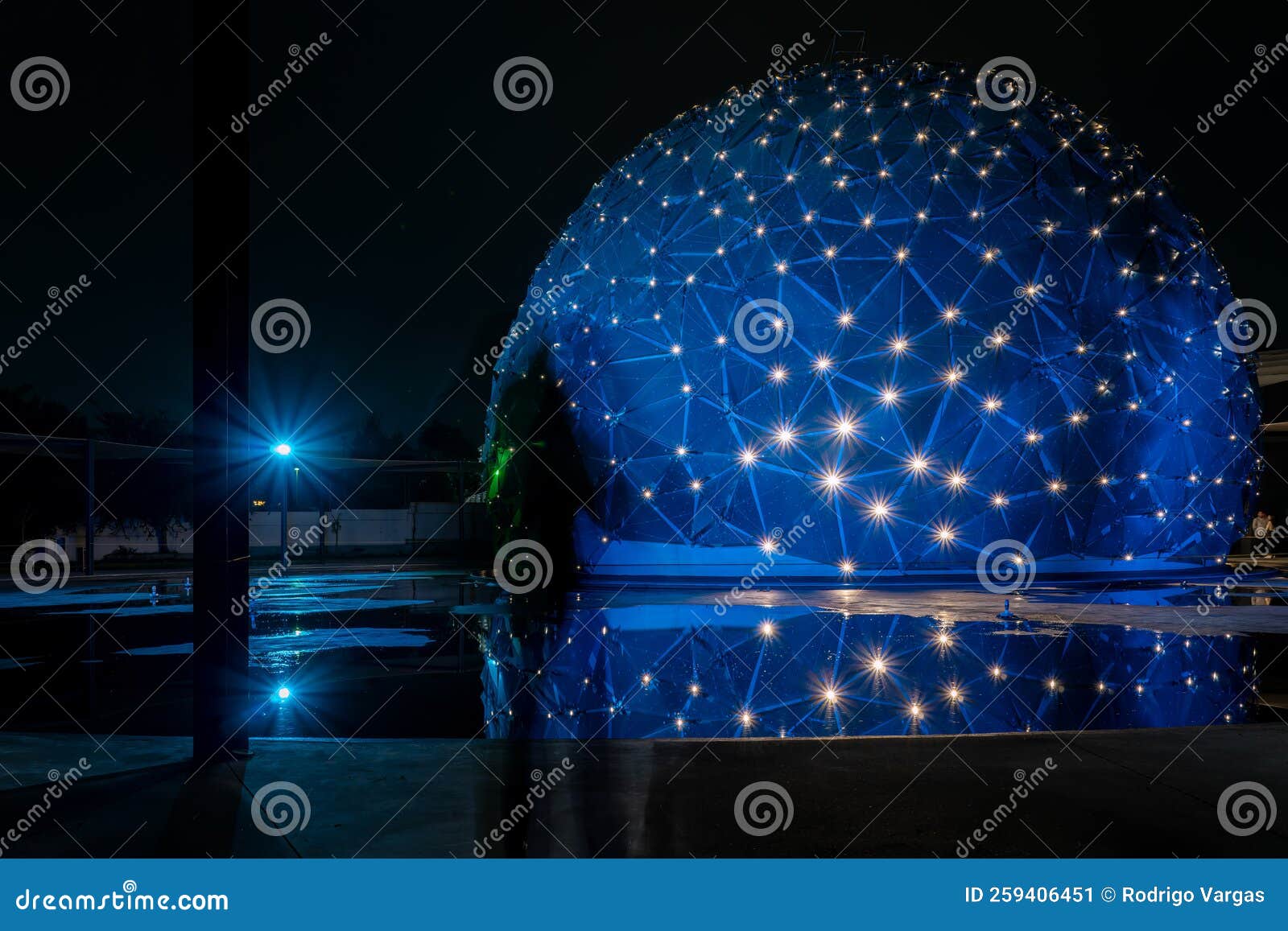 Dome Shaped Building, with Colored Lights, Reflection in Water ...